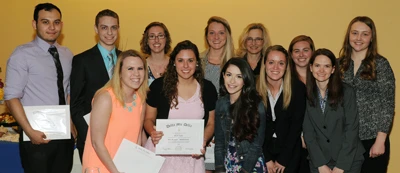 Delta Mu Delta Honor Society inducts new members | Fredonia.edu