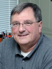 University Services Director Tzitzis receives national service award ...